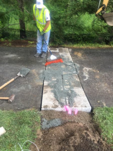 Installing a Granite Rumble Strip | Olde New England Granite